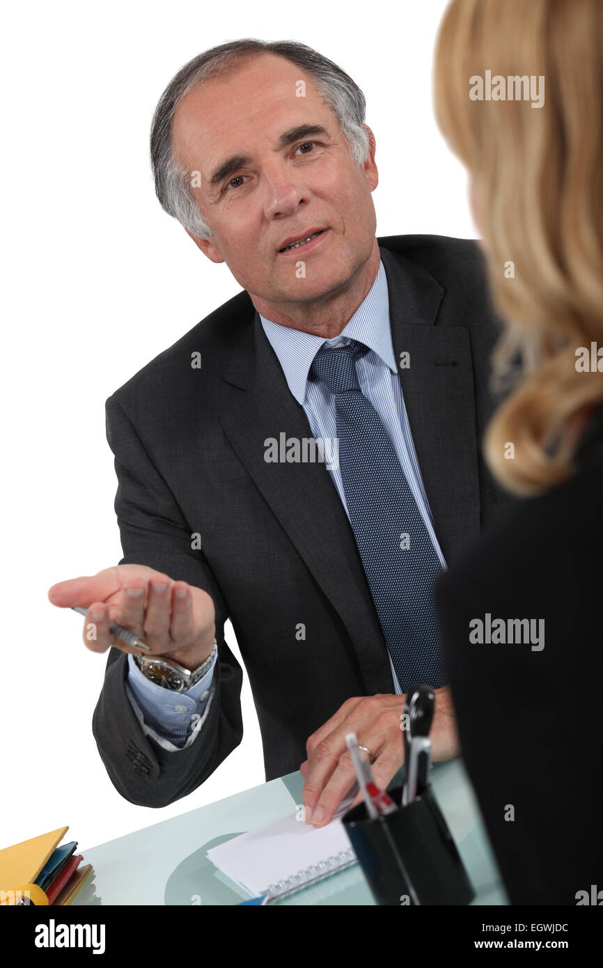 Two businesspeople having discussion Stock Photo - Alamy Two businesspeople having discussion Stock Photo - Alamy
