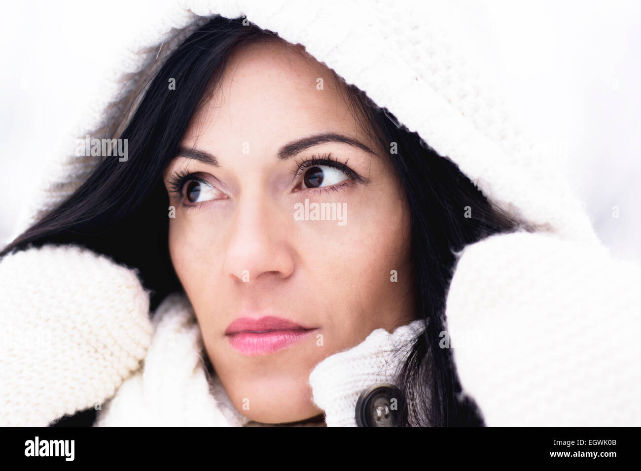 Beautiful woman looking under hood hi-res stock photography and images - Alamy