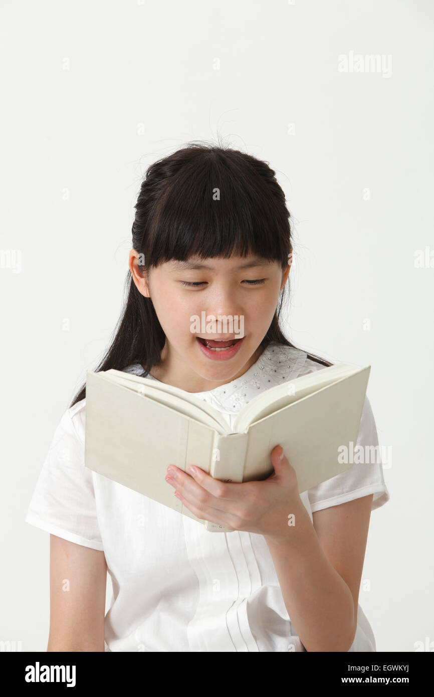 chinese girl enjoy reading book Stock Photo - Alamy