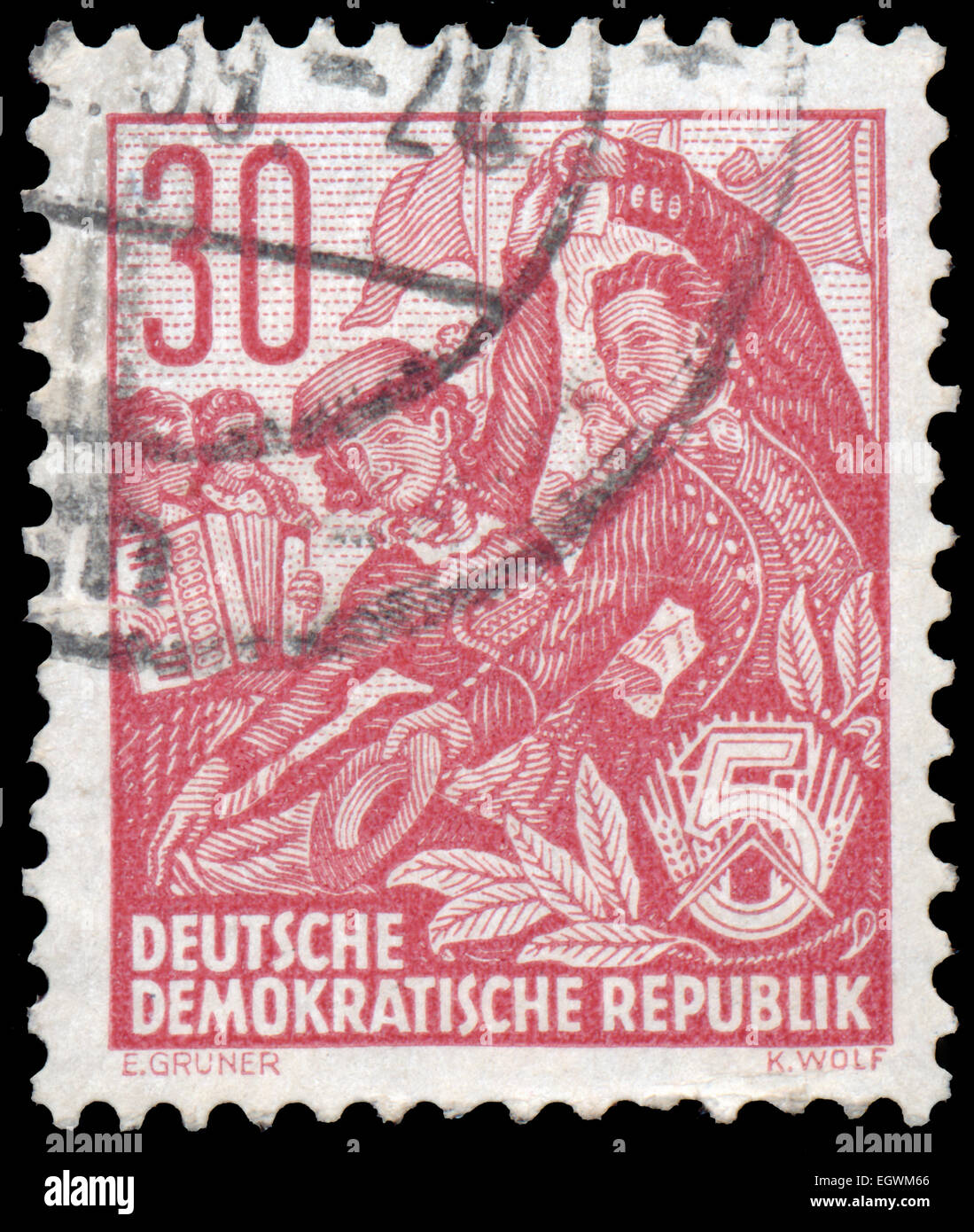 DDR - CIRCA 1953: A stamp printed in DDR, shows a Folk dance group ...