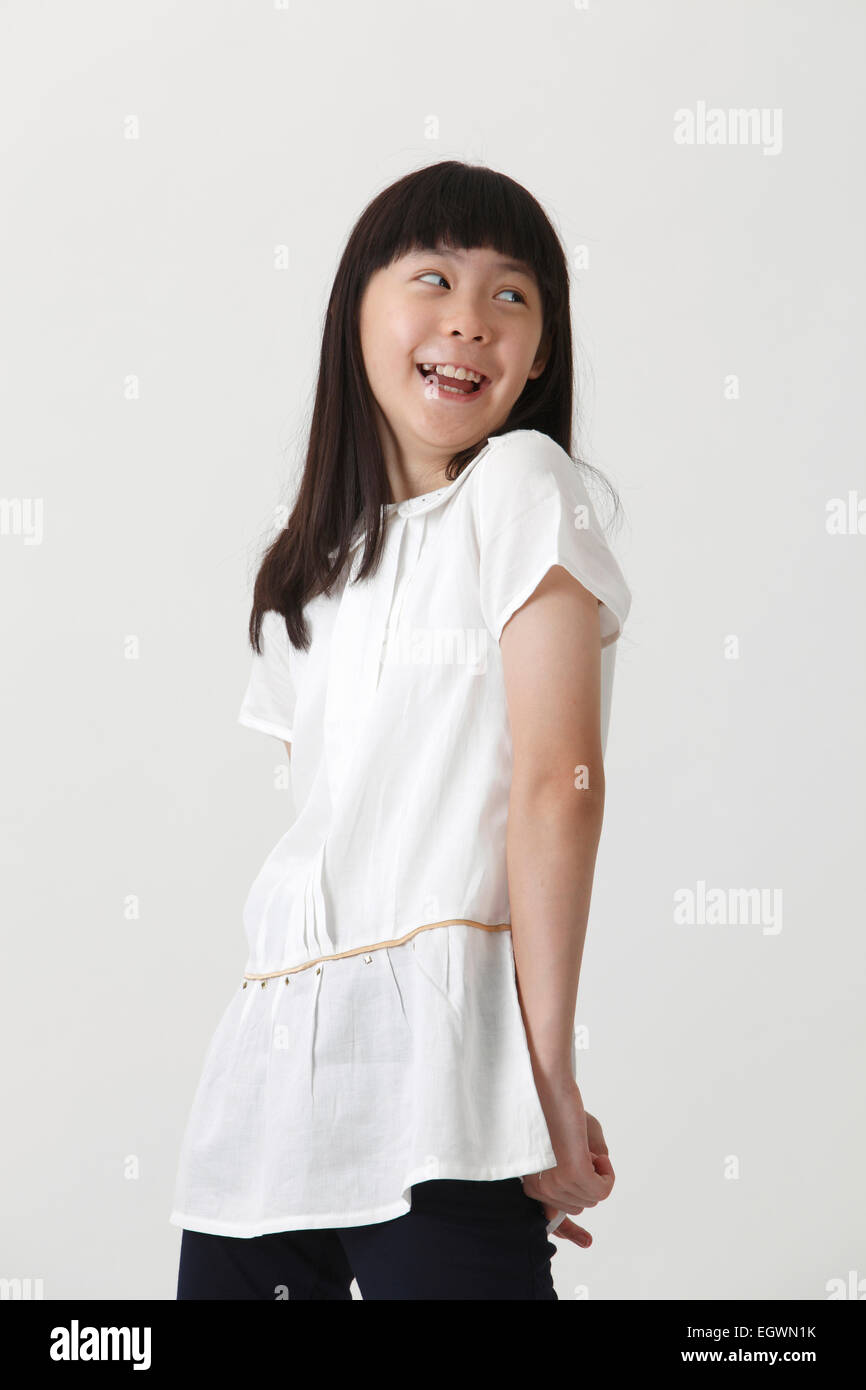 chinese girl with surprise expression and looking away Stock Photo - Alamy