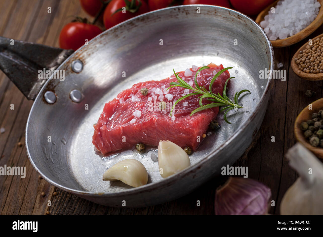 The raw beef in preparation for frying Stock Photo - Alamy