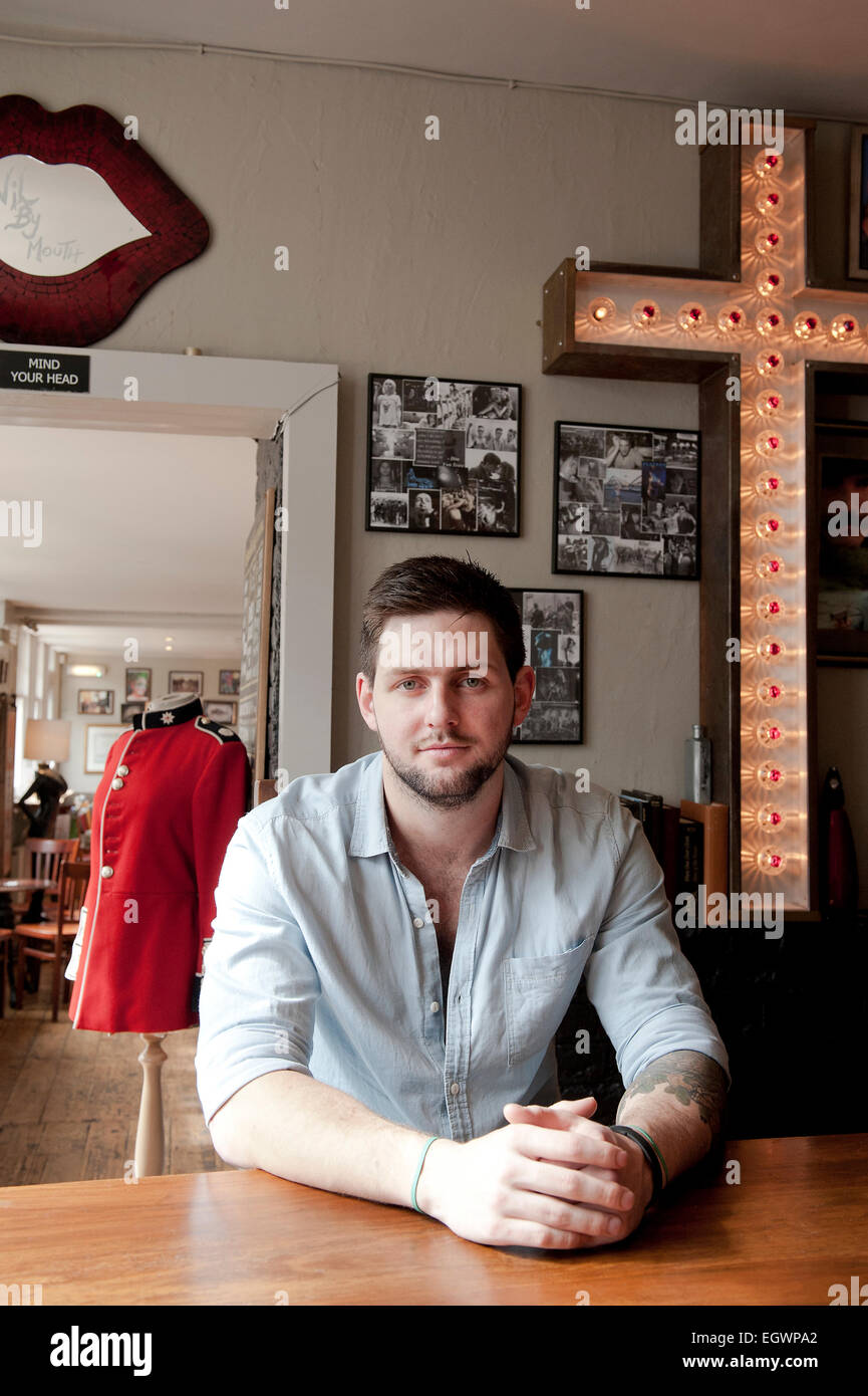 photos of a man who works as a barman, bar person in a cool & funky ...