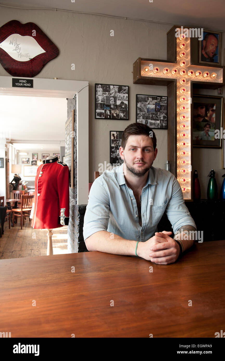photos of a man who works as a barman, bar person in a cool & funky ...