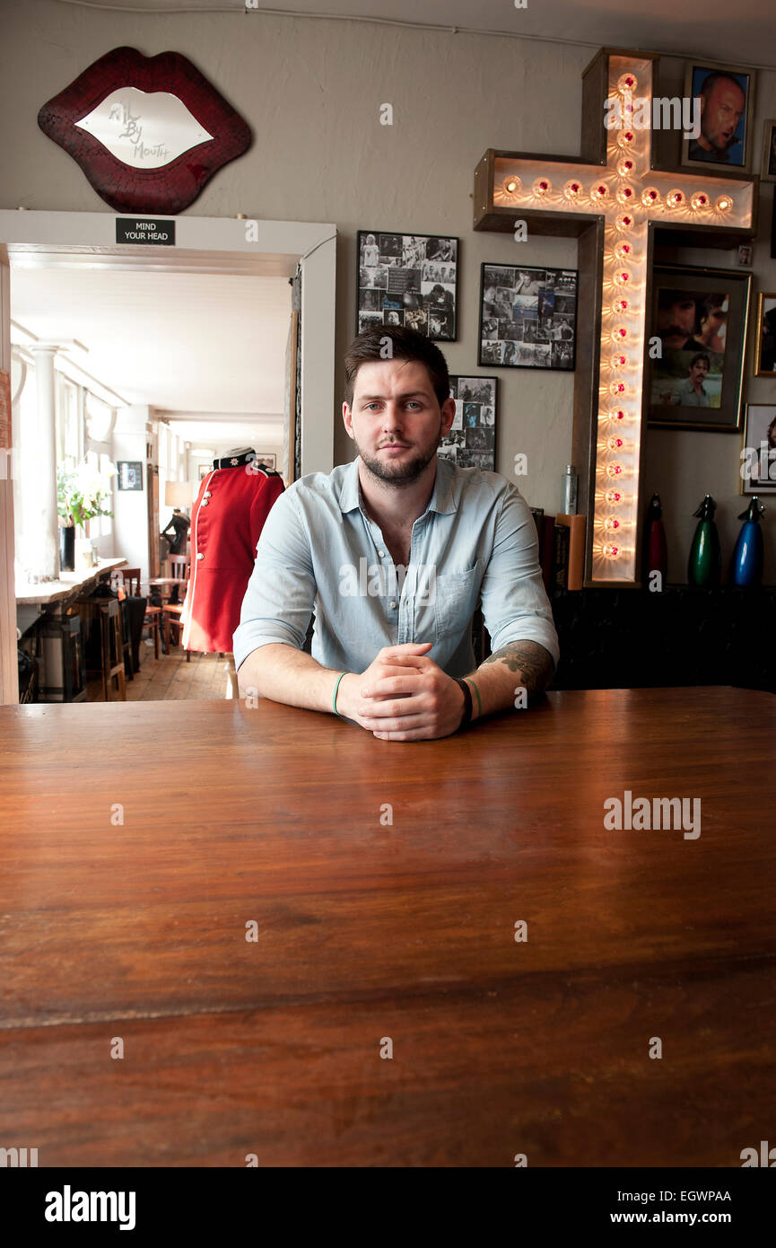 photos of a man who works as a barman, bar person in a cool & funky ...