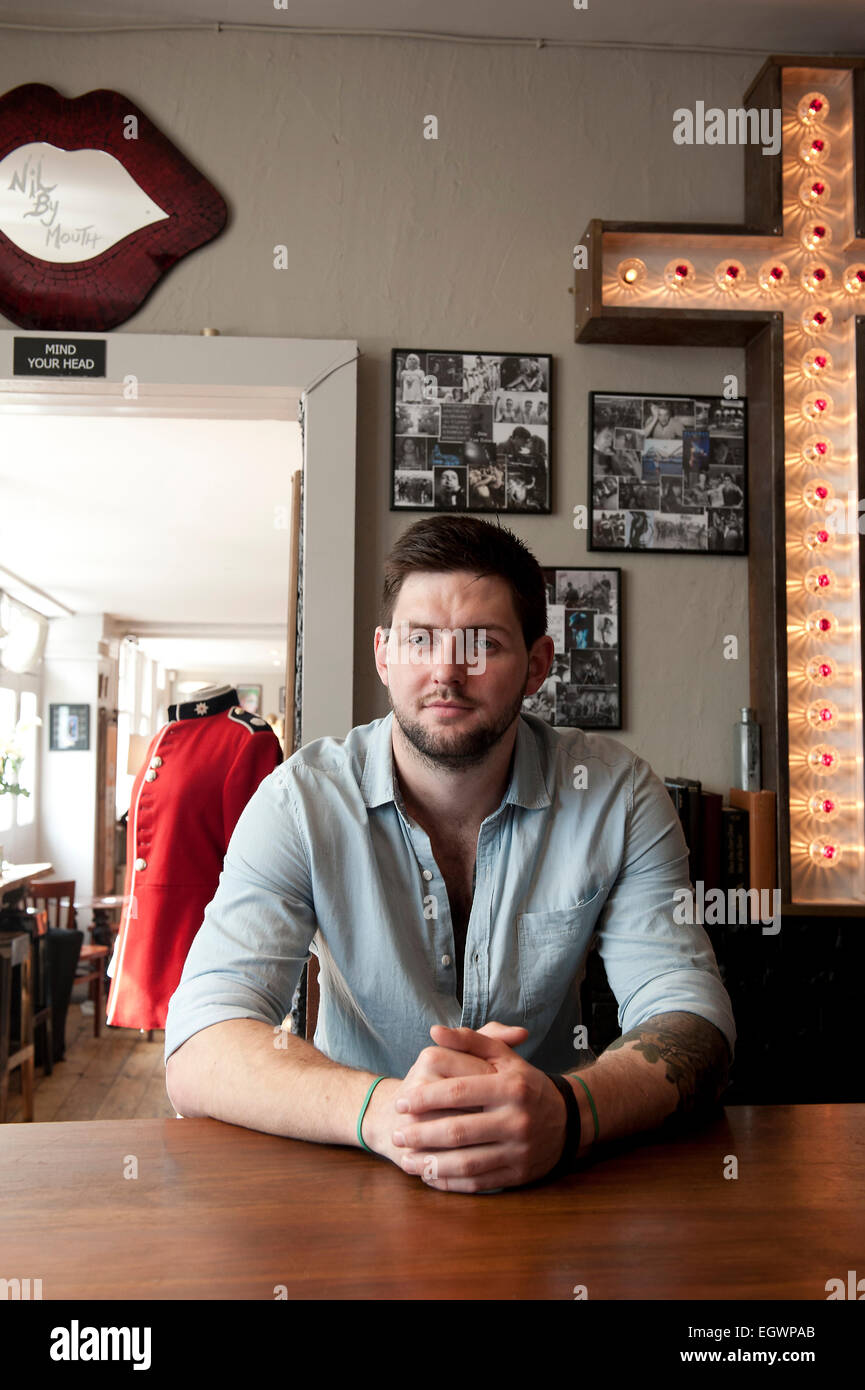 photos of a man who works as a barman, bar person in a cool & funky ...