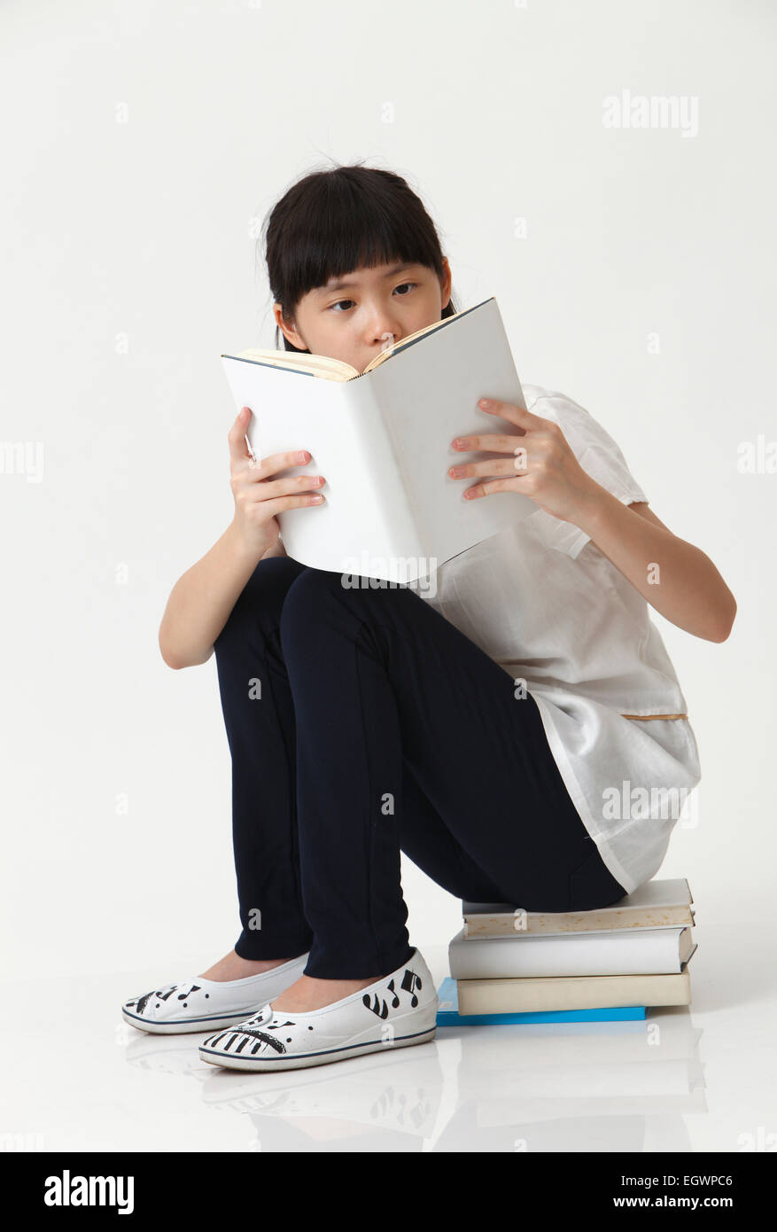 Book stack reading hi-res stock photography and images - Alamy