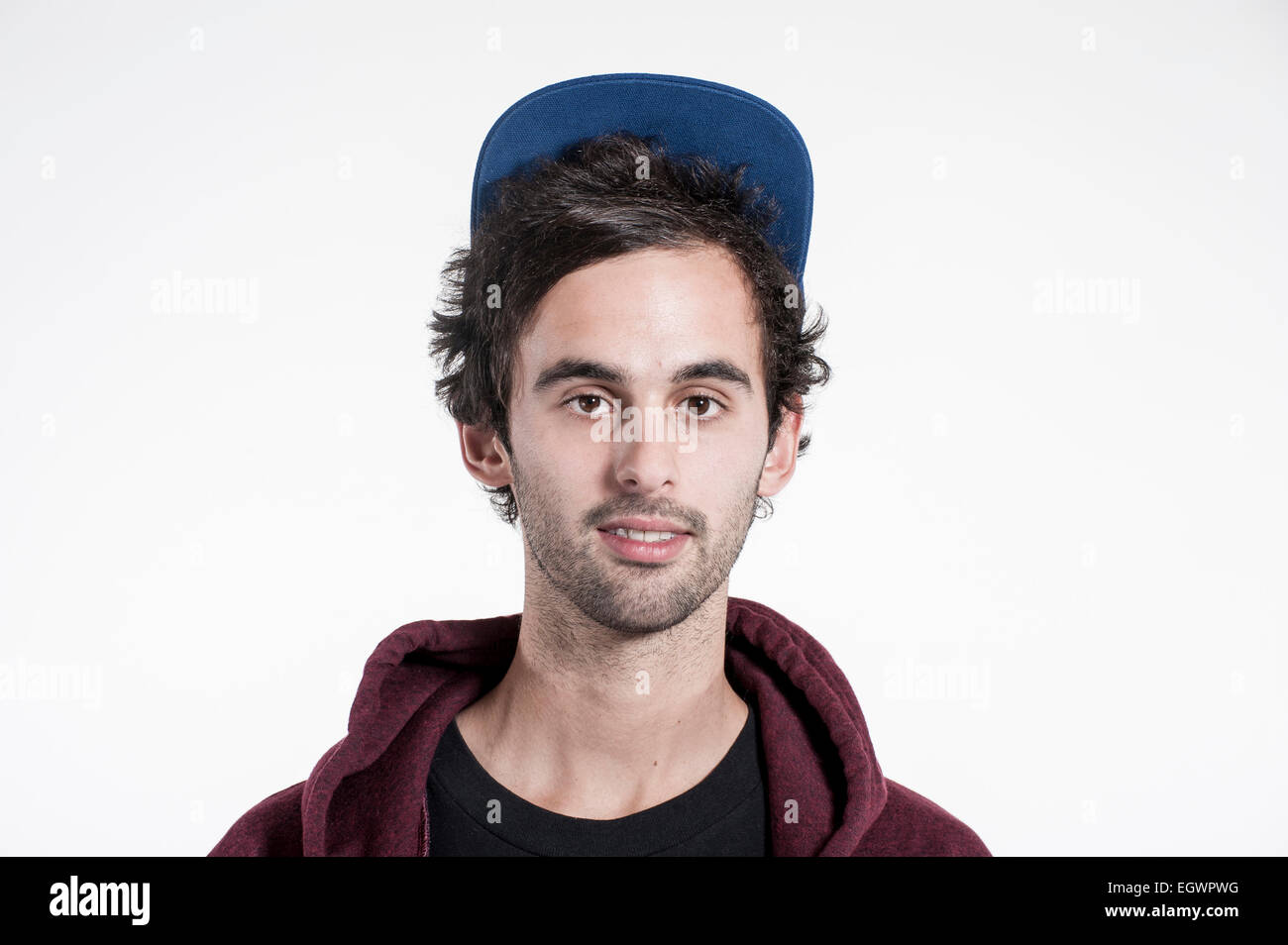 head and shoulders shot of the face of a friendly and happy 20 ...