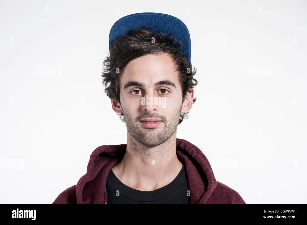 head and shoulders shot of the face of a friendly and happy 20 ...