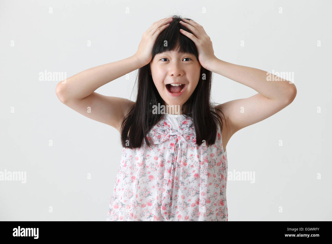 chinese girl with surprise expression Stock Photo - Alamy