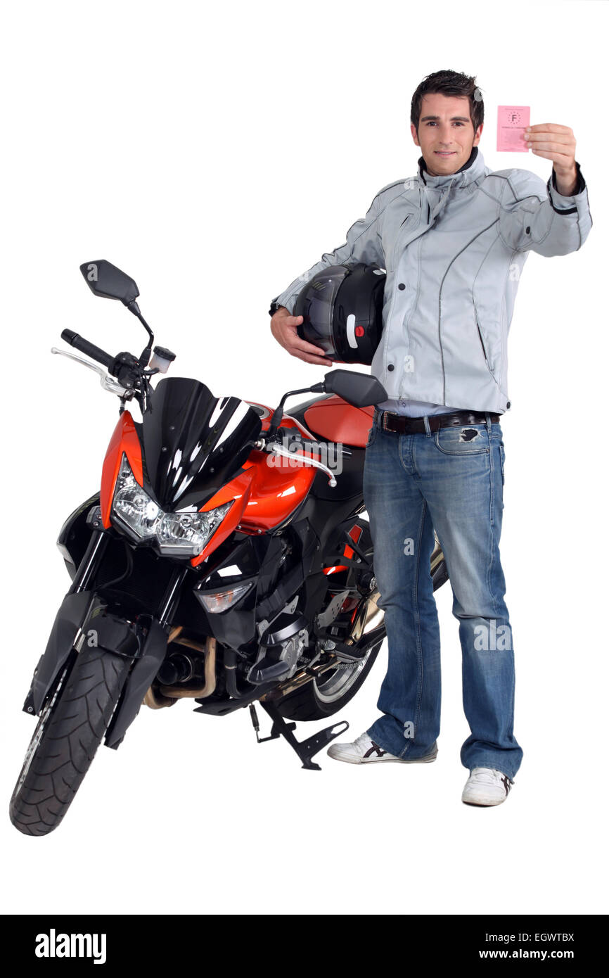 Young man first motorcycle Cut Out Stock Images & Pictures - Alamy