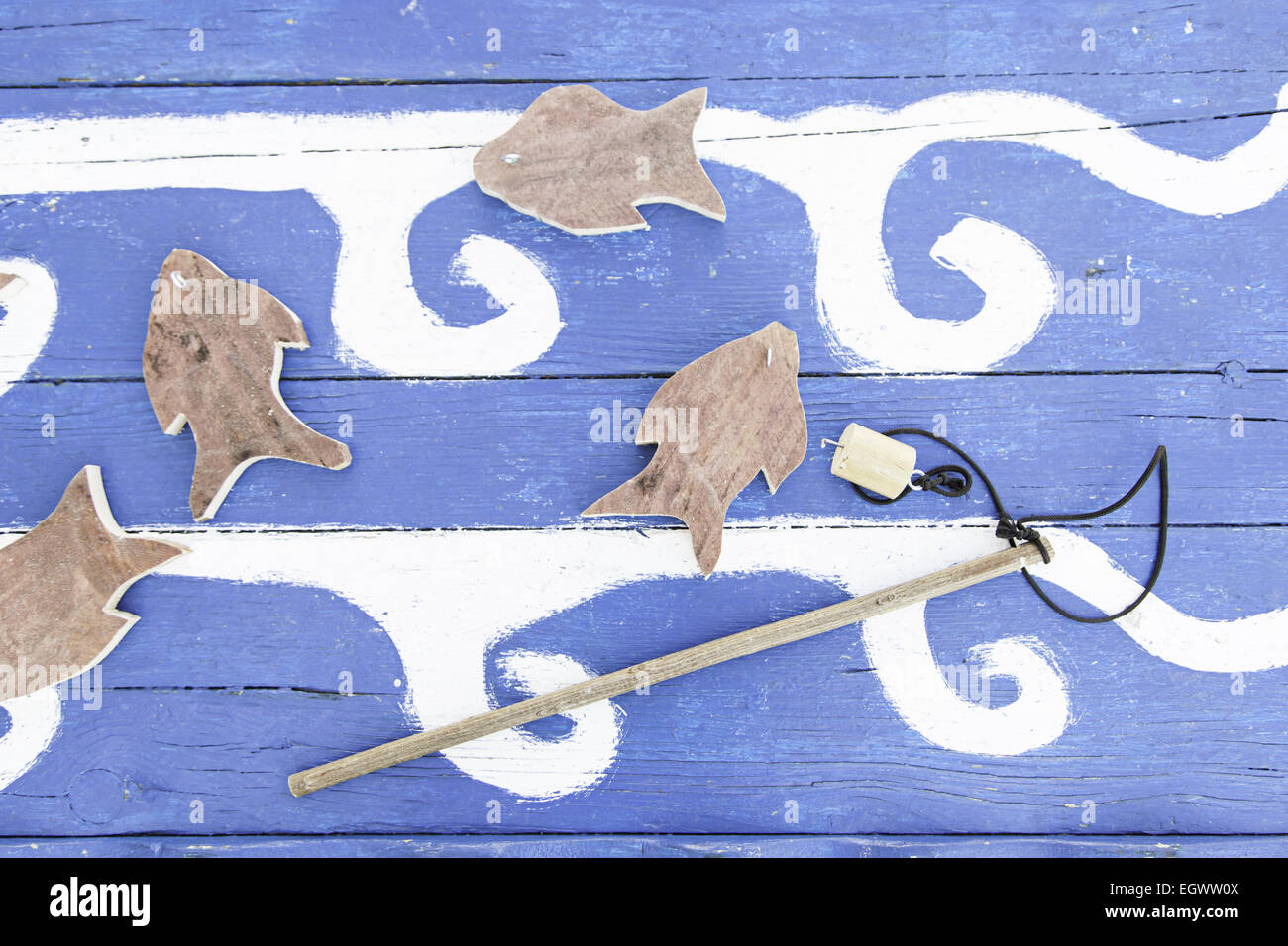 Set of wooden fish, detail of an old fishing game for children Stock ...