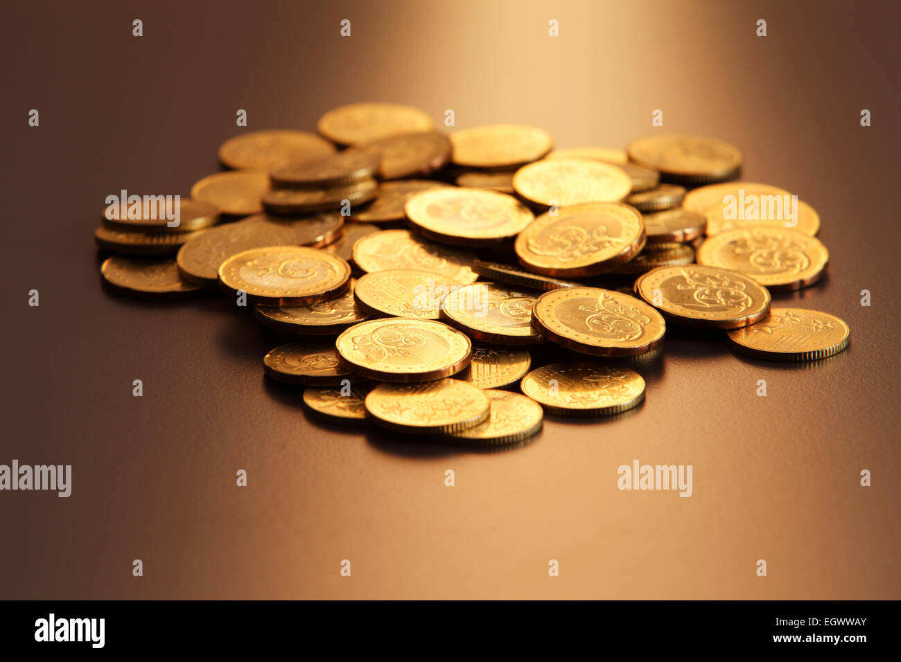 Golden coins pile hi-res stock photography and images - Alamy