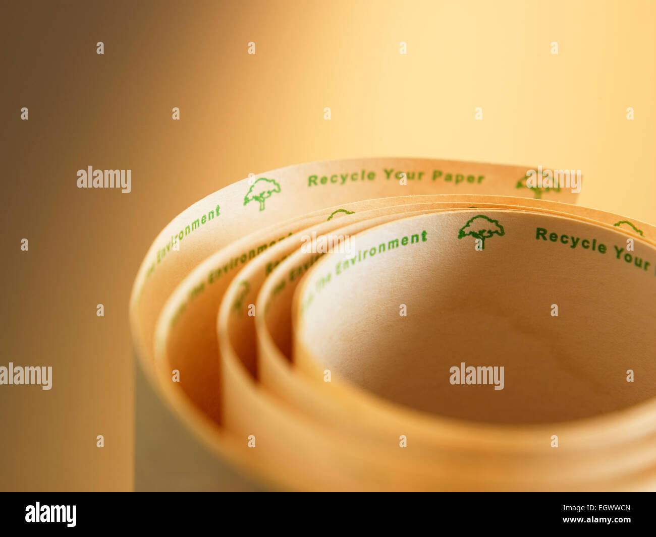 rolled up recycle adding machine tape Stock Photo - Alamy