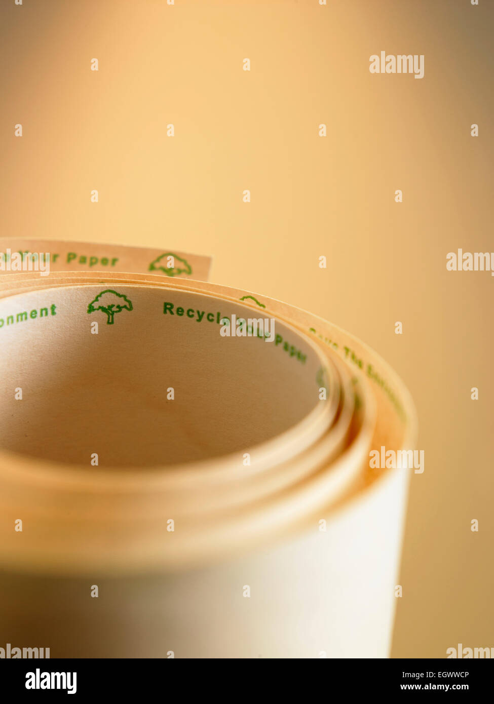rolled up recycle adding machine tape Stock Photo - Alamy
