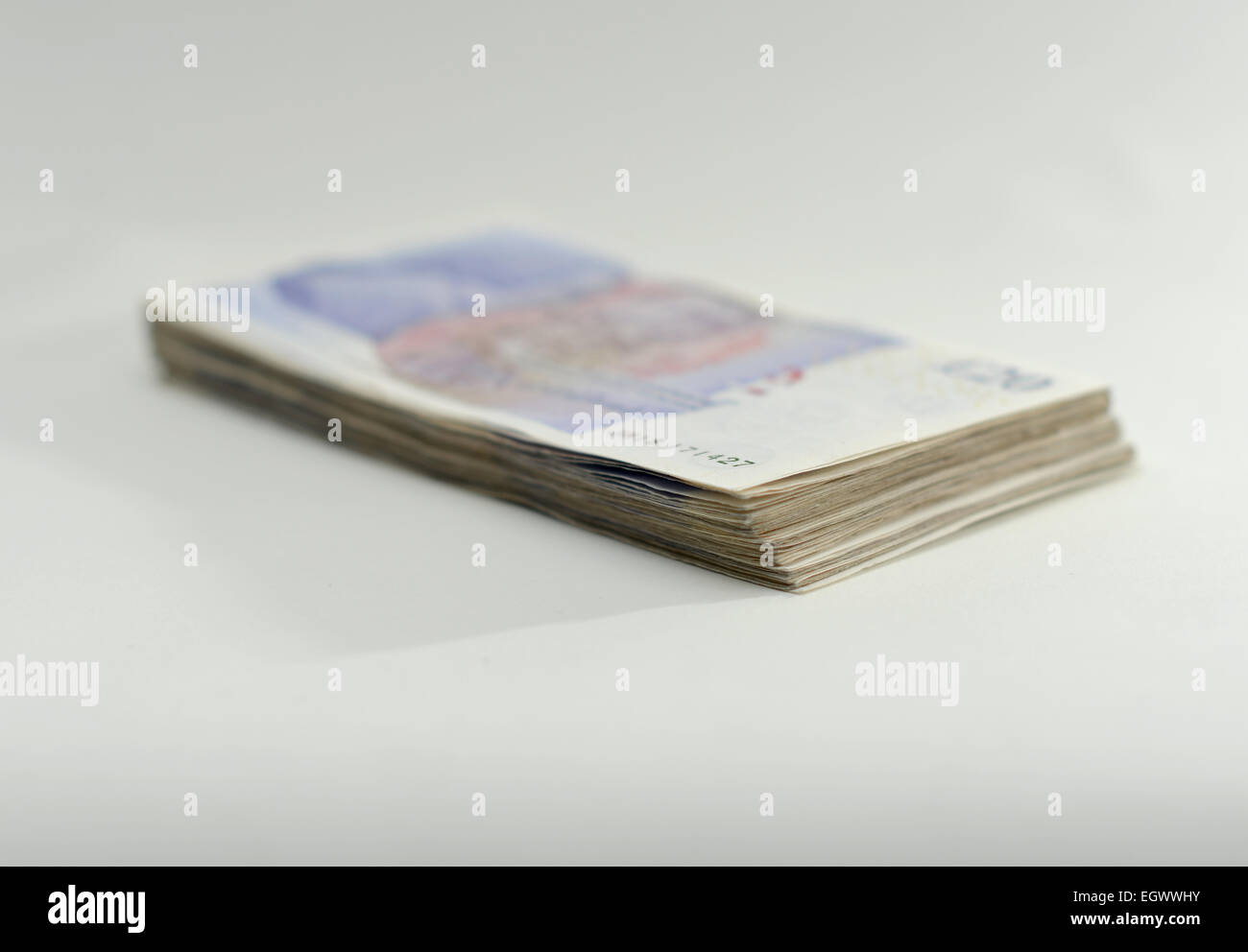 £1000 in £20 notes. A stack of 50 Twenty pound notes making a grand in ...