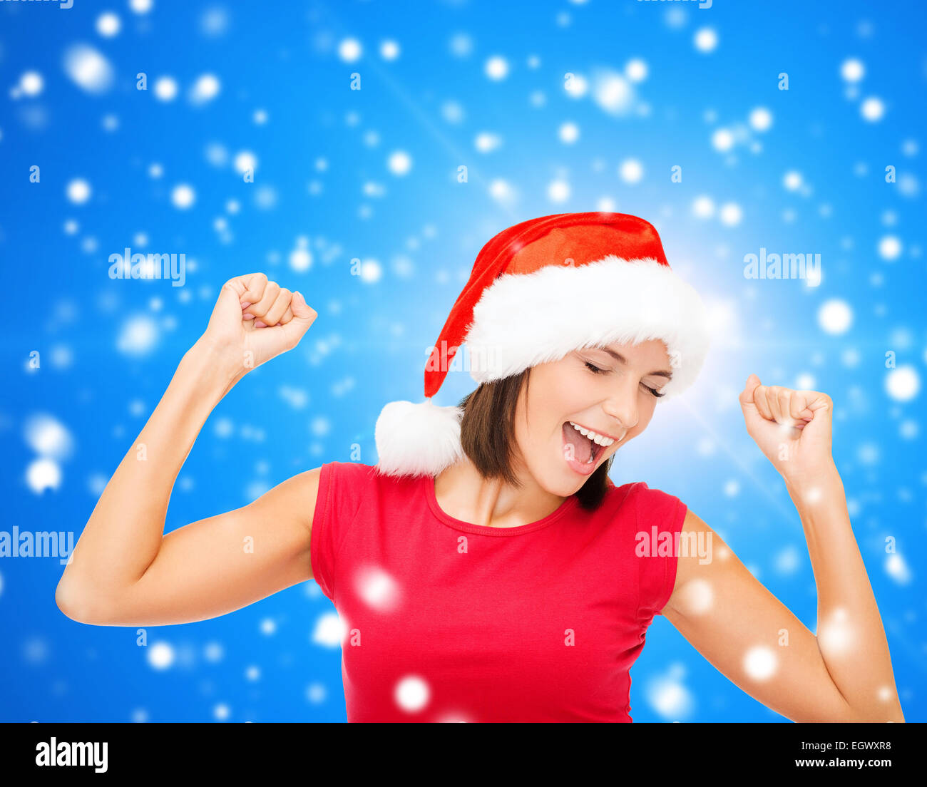 smiling woman in santa helper hat Stock Photo - Alamy