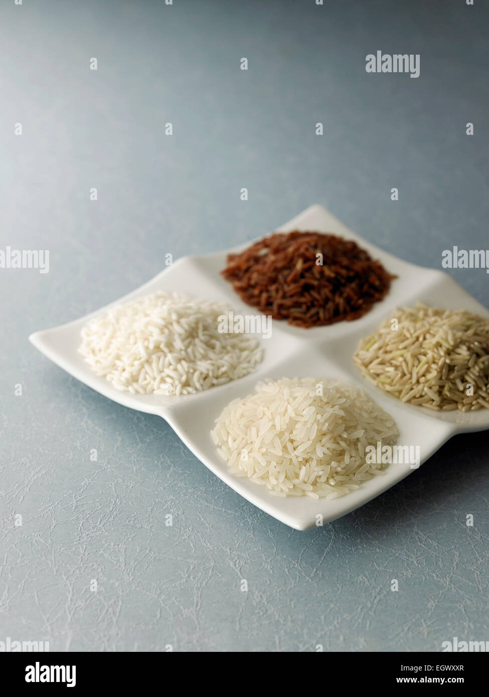 few different type of rice on the square plate Stock Photo - Alamy
