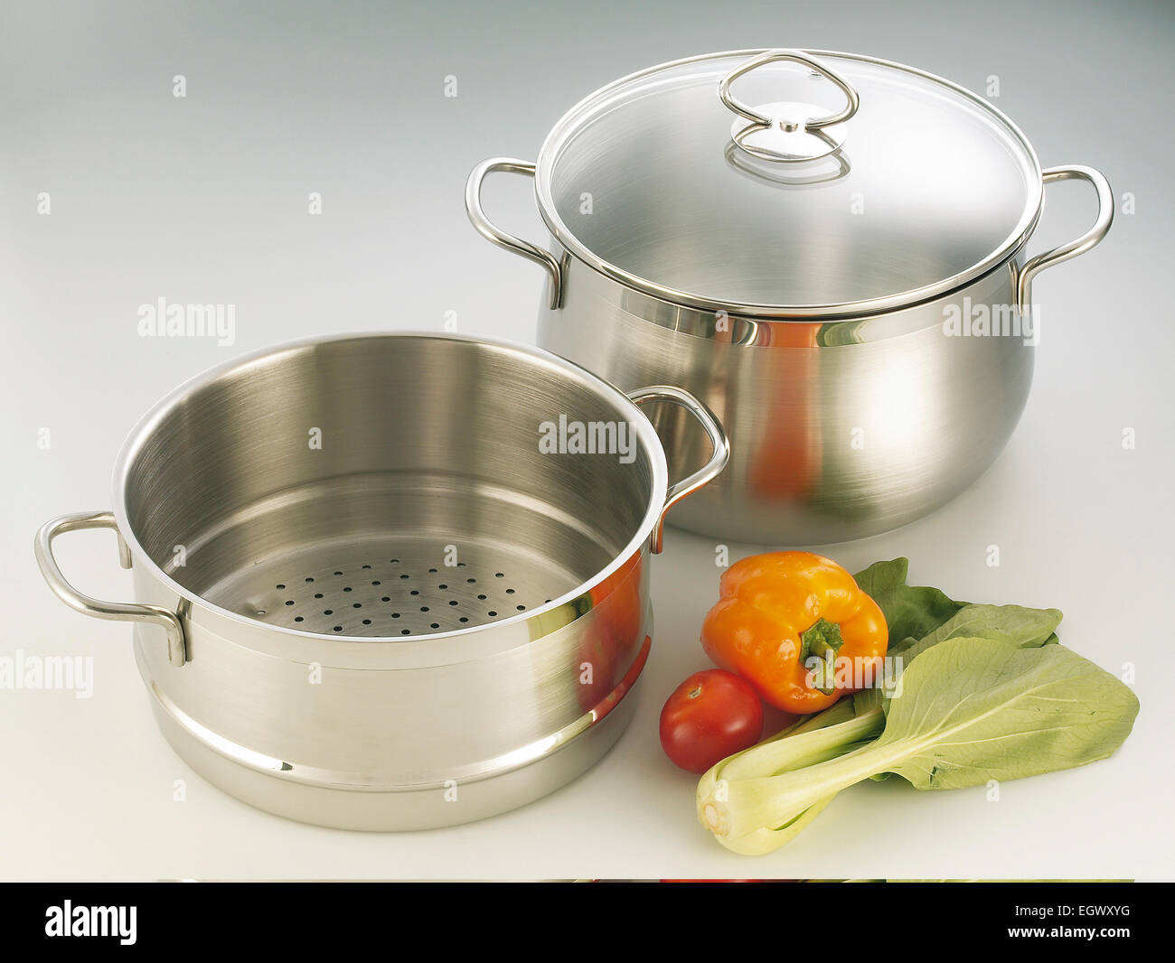 multi porpose cooking pot with steamer Stock Photo - Alamy