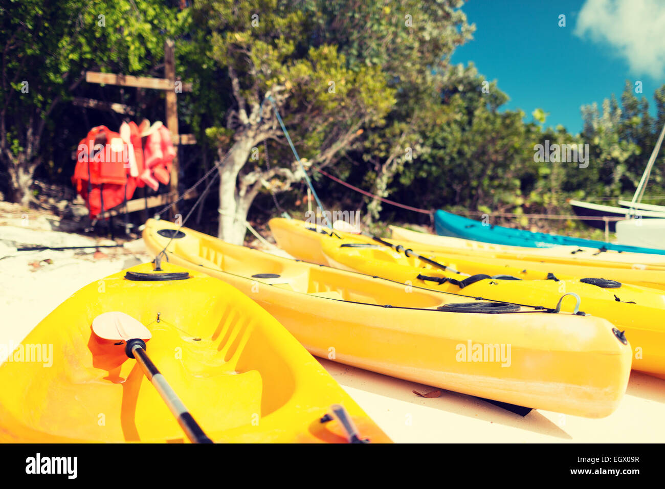 canoes on sandy beach Stock Photo - Alamy