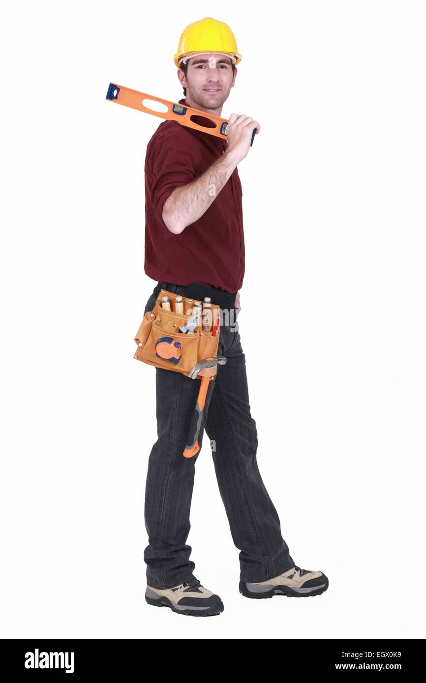 craftsman holding a level Stock Photo - Alamy