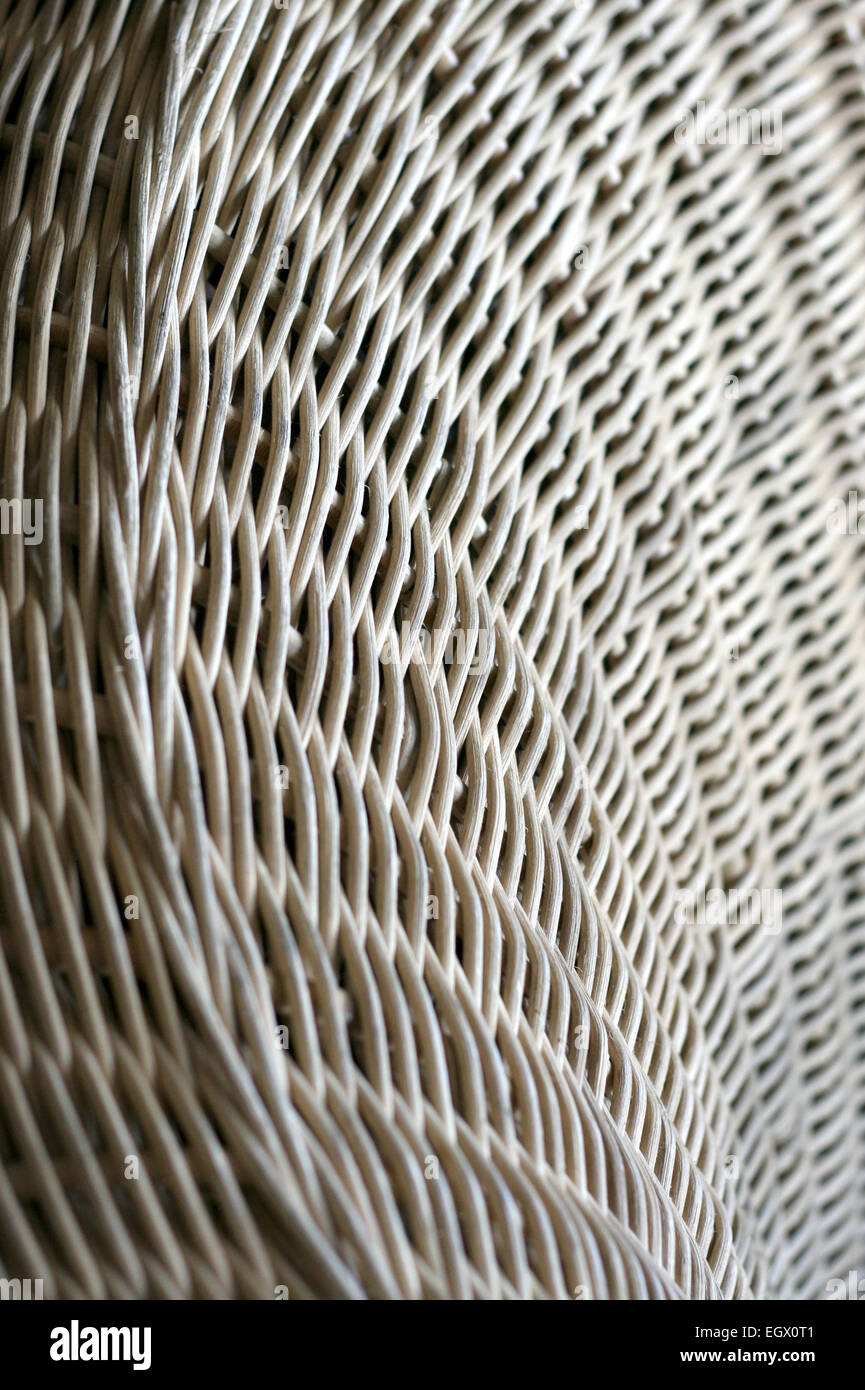 Cane or wickerwork background- showing the details of interlaced weave ...