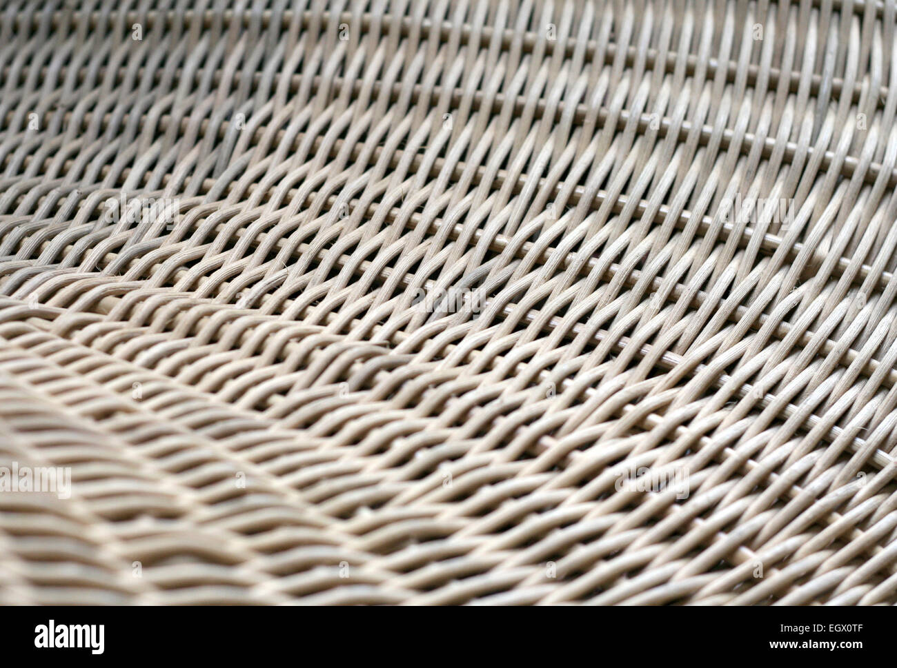 Cane or wickerwork background- showing the details of interlaced weave ...