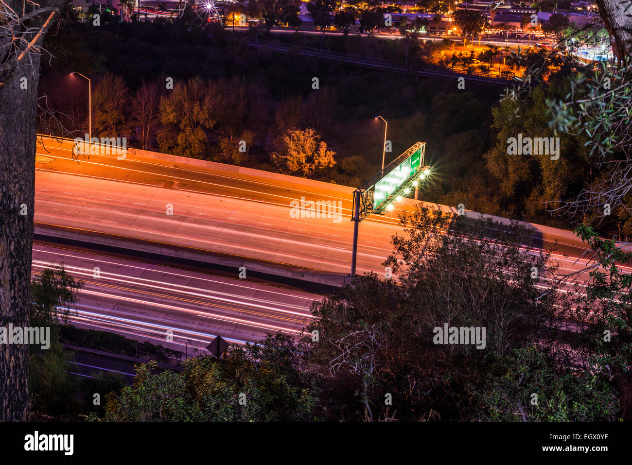 Looking down on Interstate Highway 8 at night with car light streaks ...