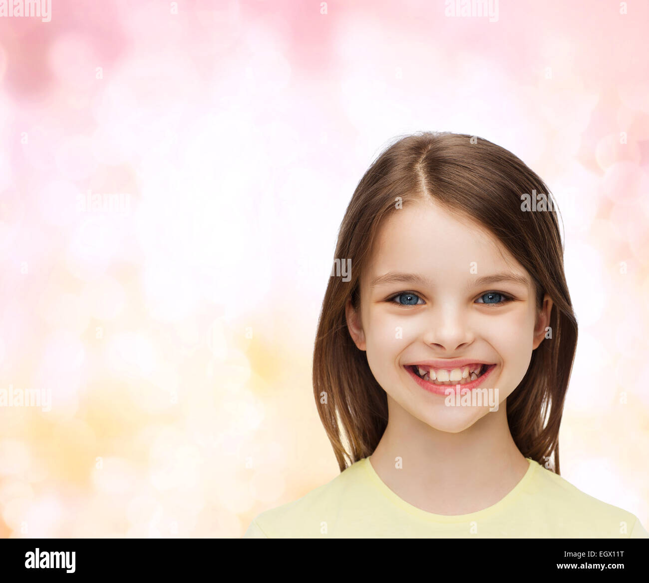 smiling little girl over white background Stock Photo - Alamy