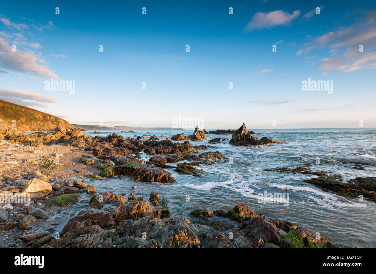 The beach at Portwrinkle in Cornwall, looking out toward the Rame ...