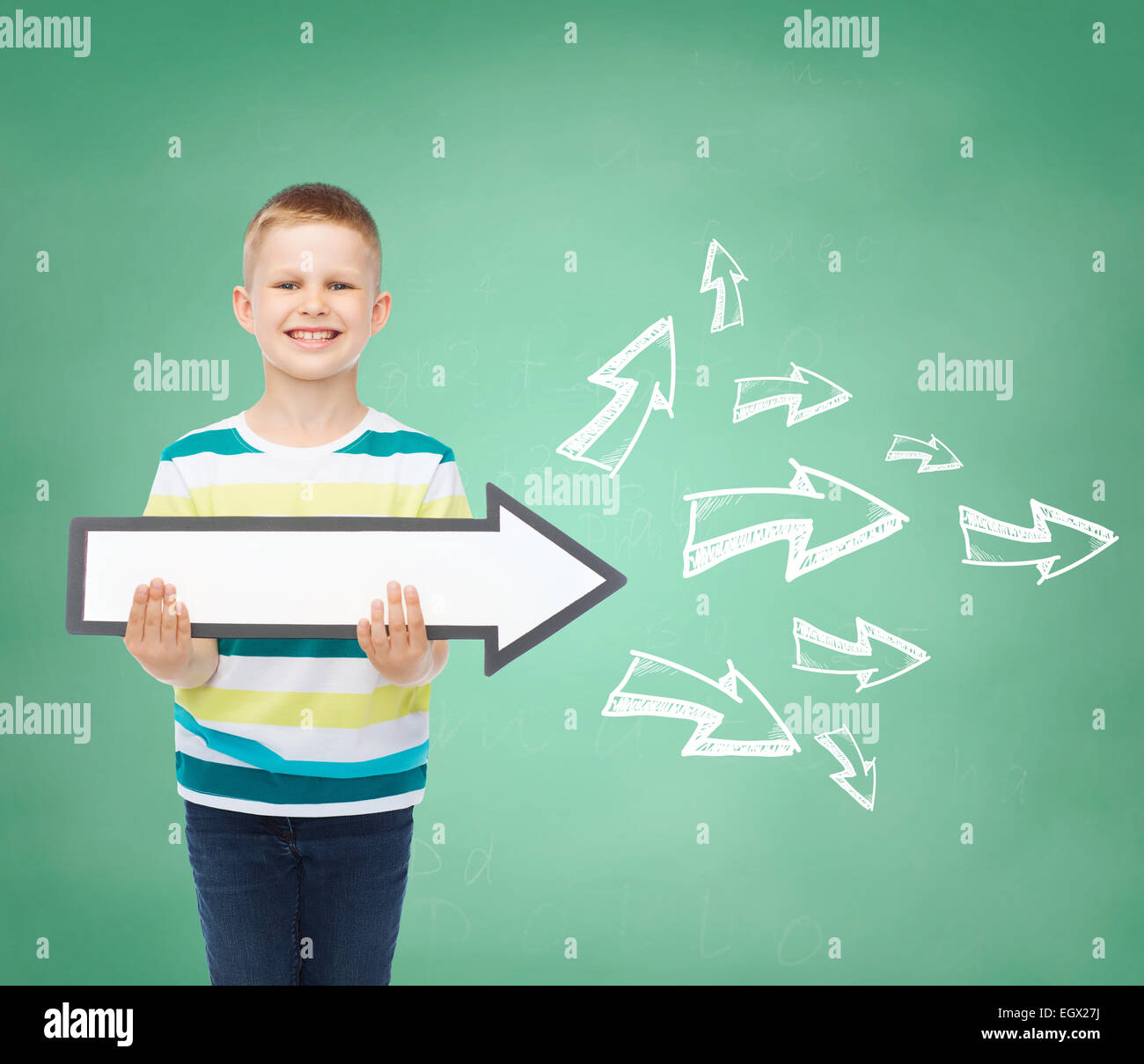 smiling little boy with blank arrow pointing right Stock Photo - Alamy