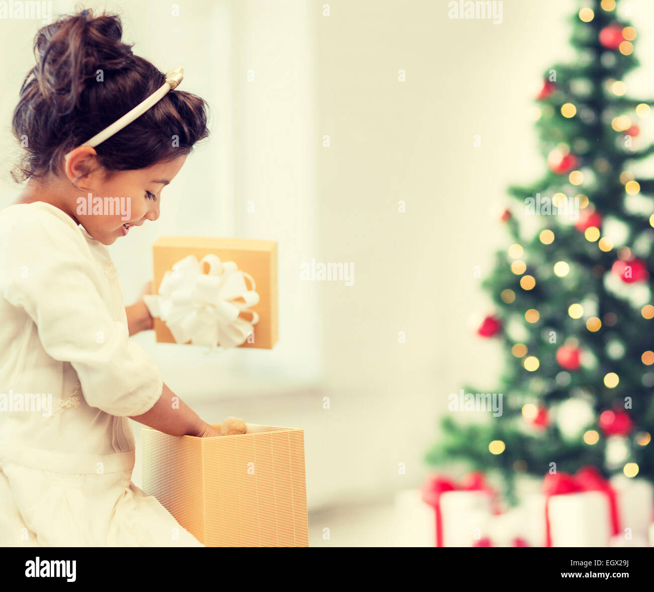 happy child girl with gift box Stock Photo - Alamy