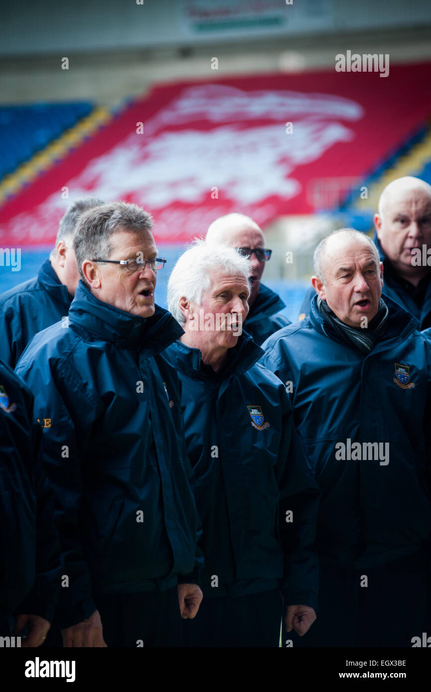 Welsh male voice choir singing at London Welsh rugby match on St ...