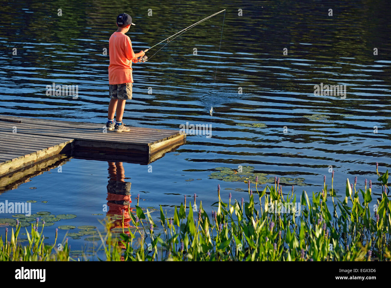 Boy at docks hi-res stock photography and images - Alamy