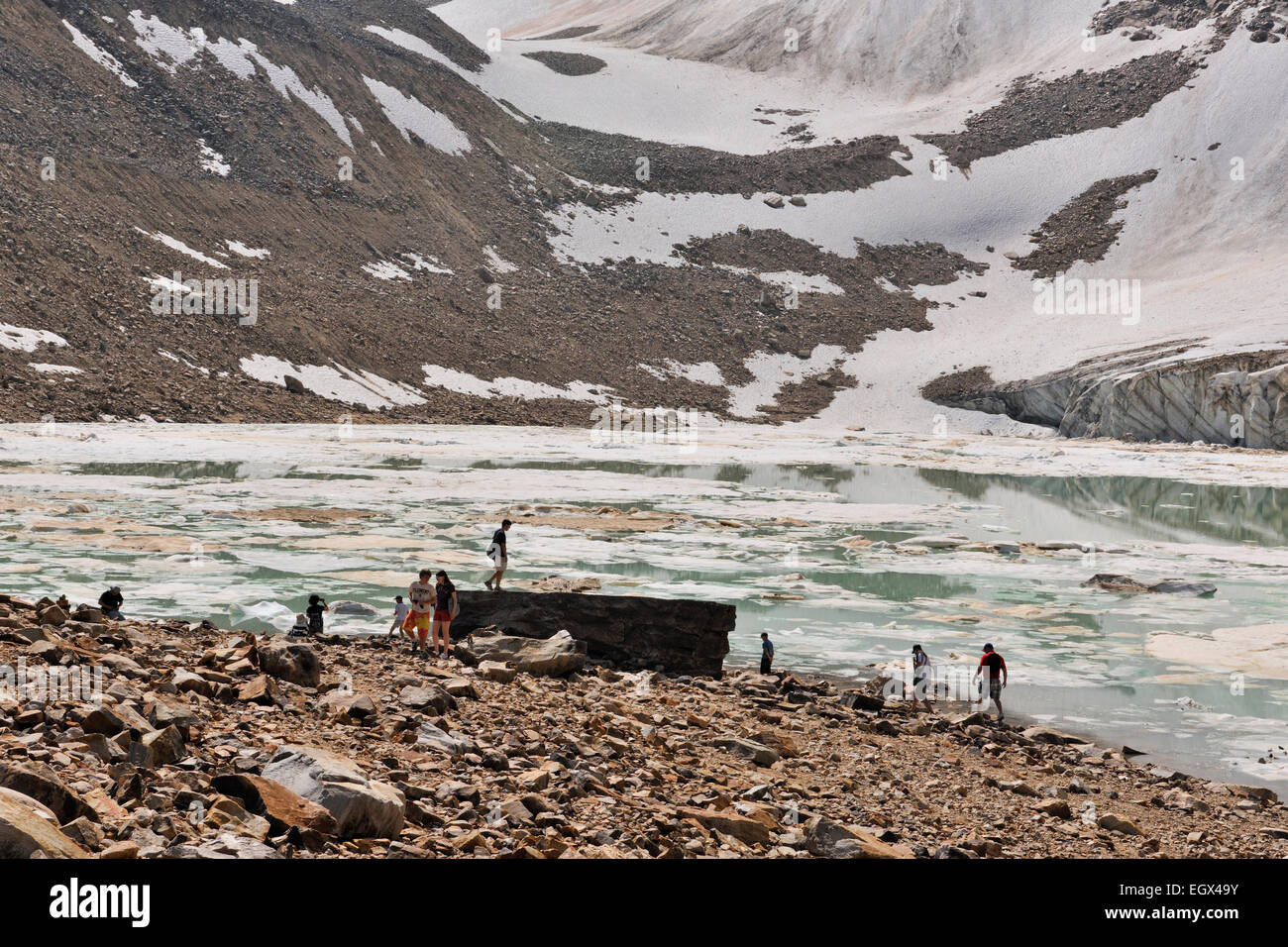 Tourists visiting Cavell Lake below Mt. Edith Cavell, Jasper National ...