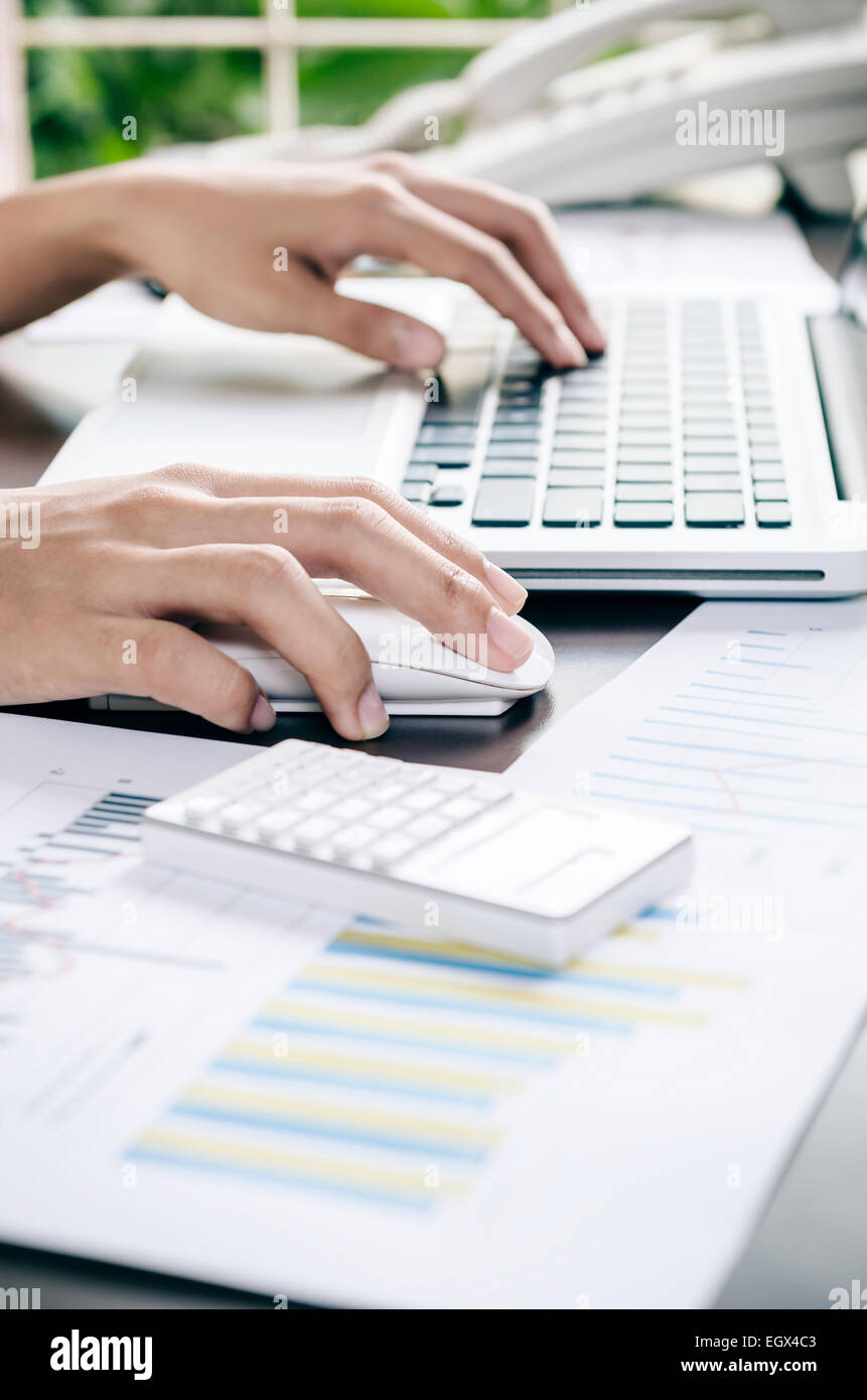 Working with computer Stock Photo - Alamy