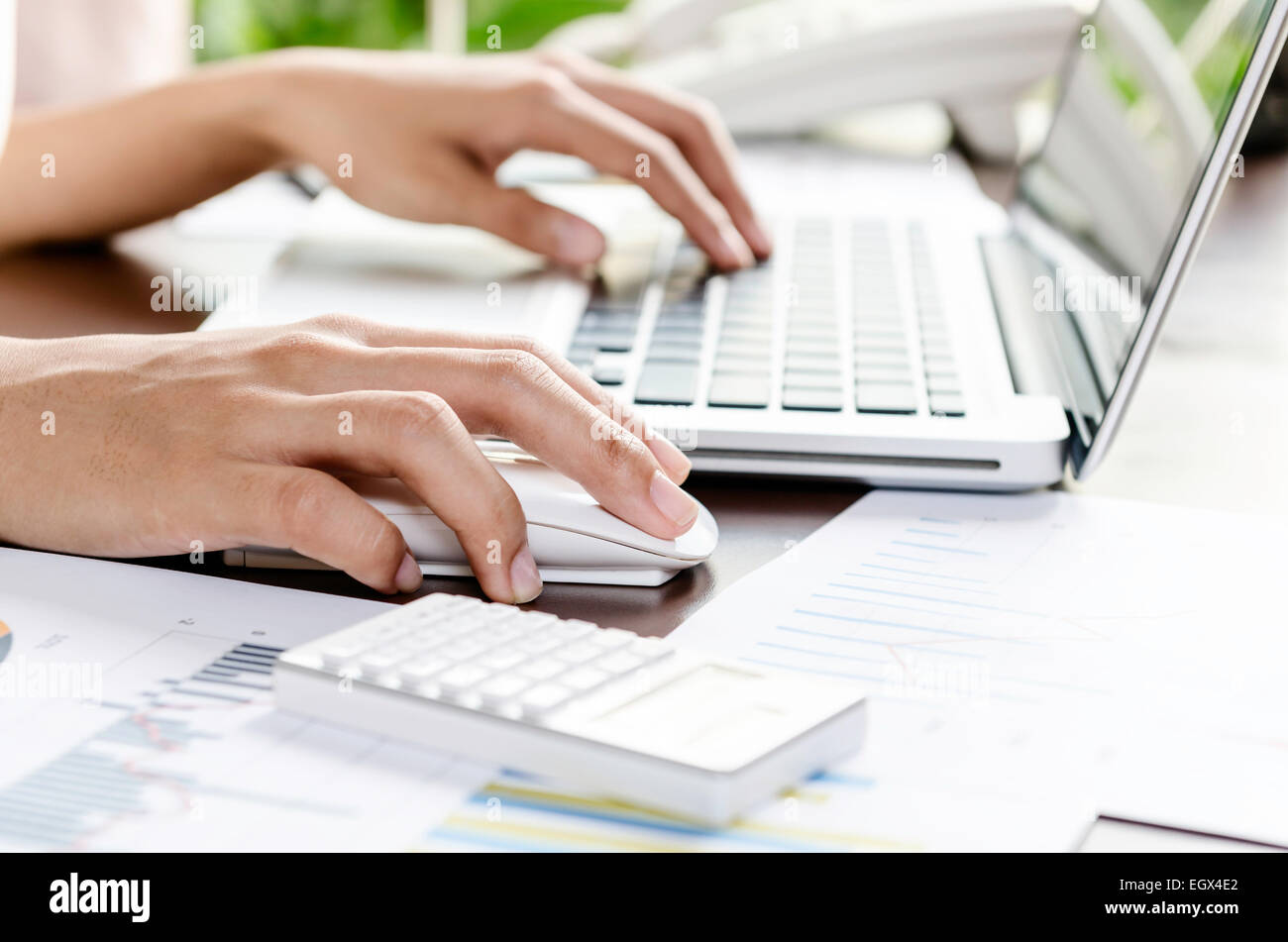 Working with computer Stock Photo - Alamy
