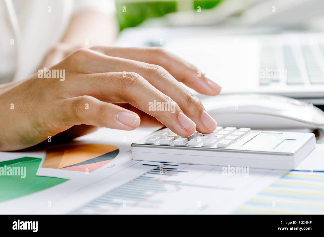 Working with calculator Stock Photo - Alamy