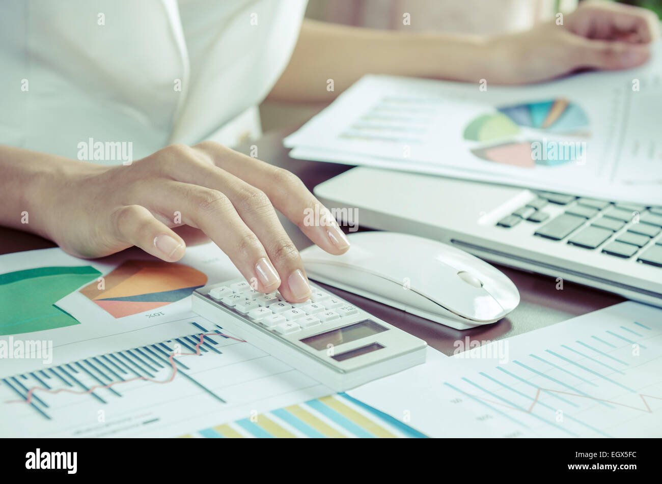 Working with calculator Stock Photo - Alamy