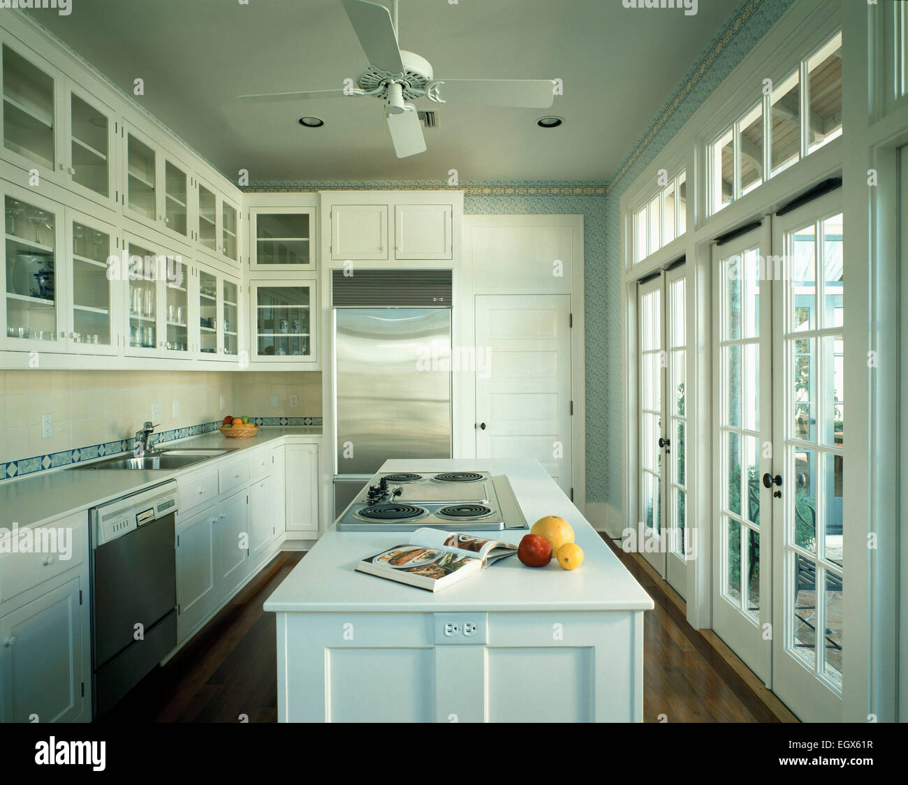 Modern kitchen with white units Stock Photo - Alamy