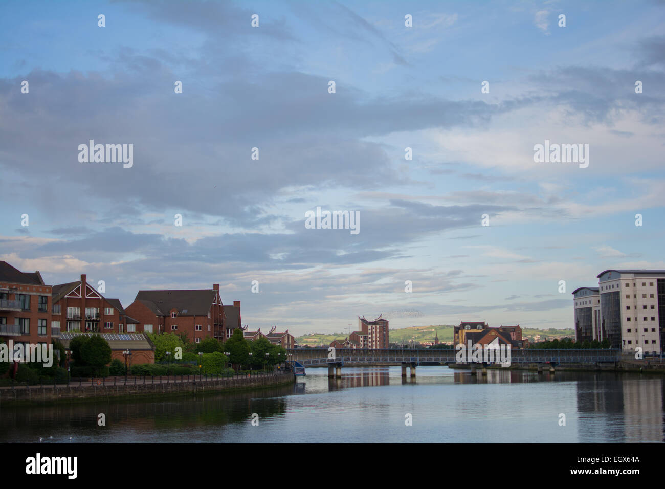 City of Belfast with a bridge and some mountains in the background ...