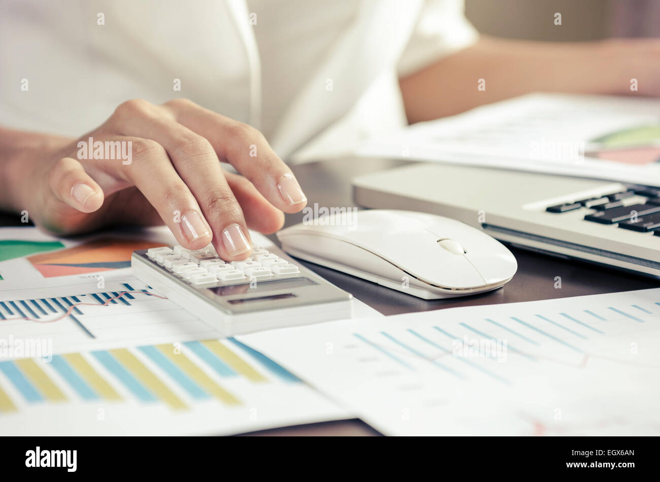 Working with calculator Stock Photo - Alamy