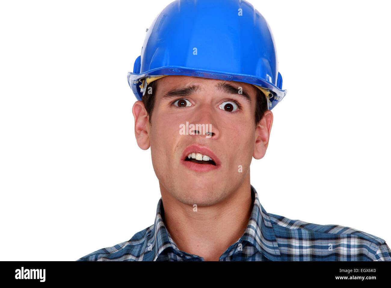 A horrified tradesman Stock Photo - Alamy