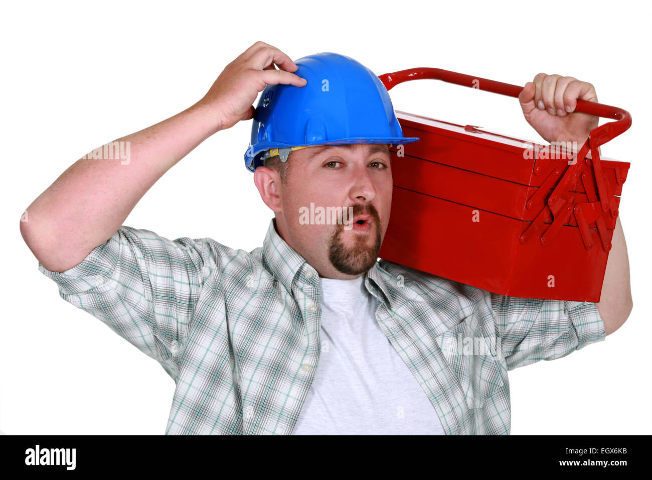 Man carrying tool box on shoulders Stock Photo - Alamy