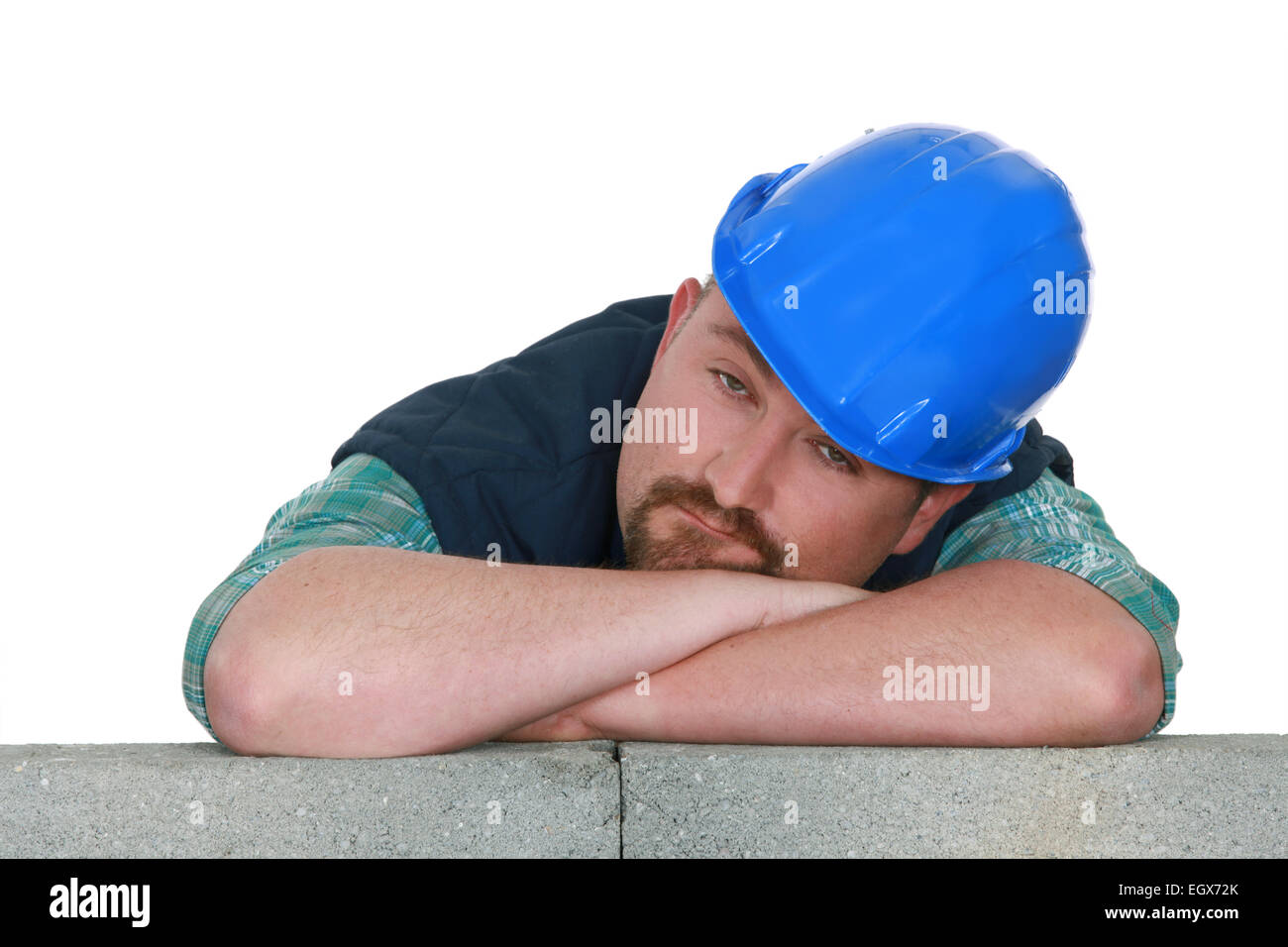 Bored tradesman at work Stock Photo - Alamy
