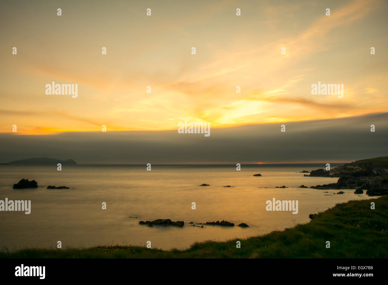 sundown at Ireland's coast Stock Photo - Alamy