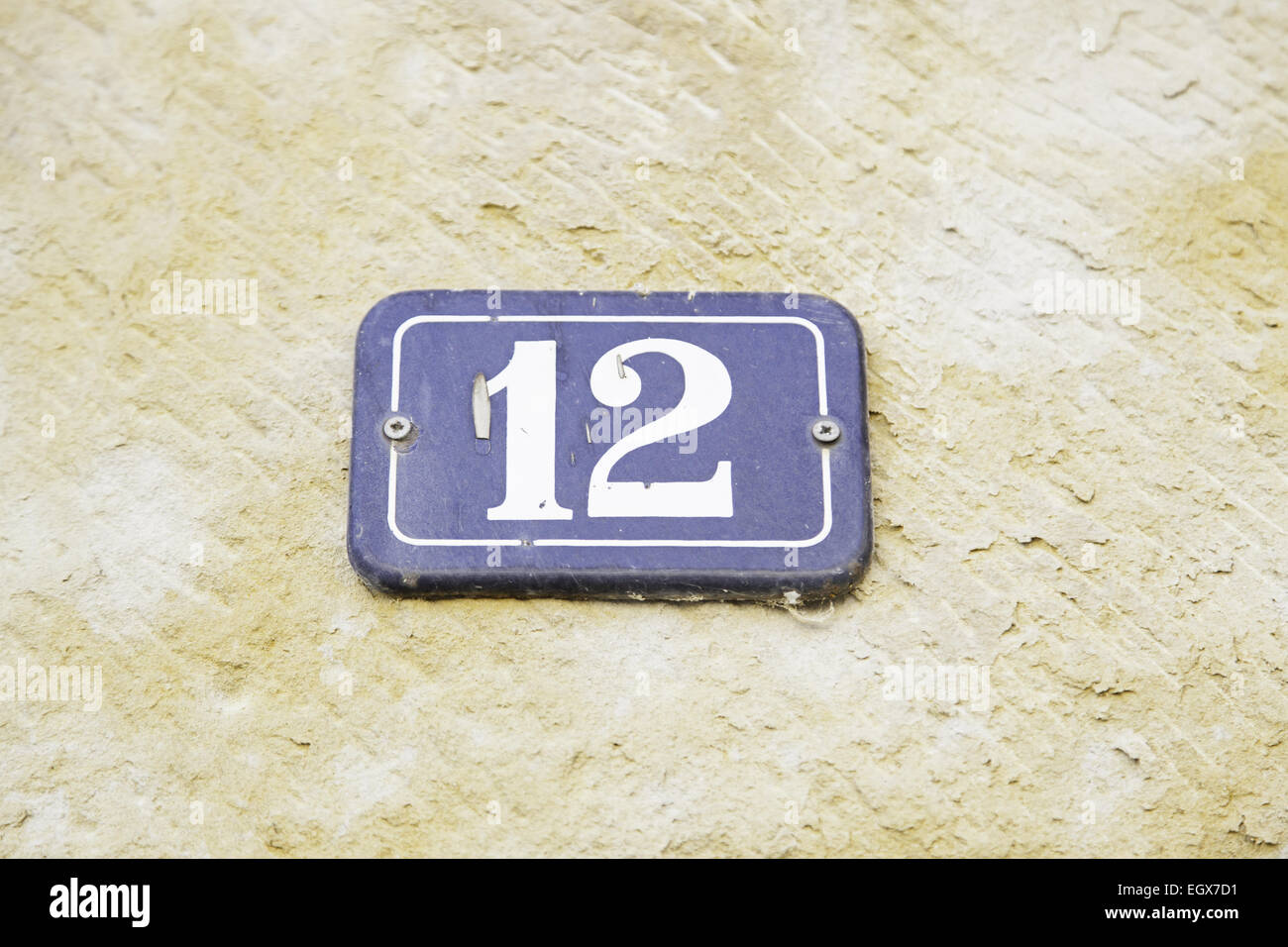 Number twelve wall of a house, detail of a number of information, even ...