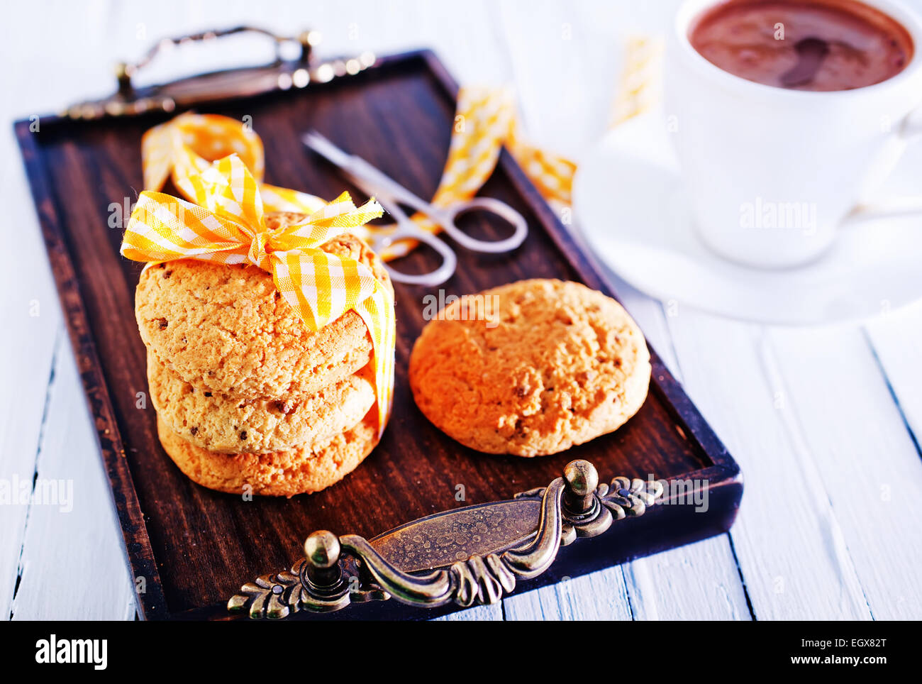 cookies and tea in cup and on a table Stock Photo - Alamy