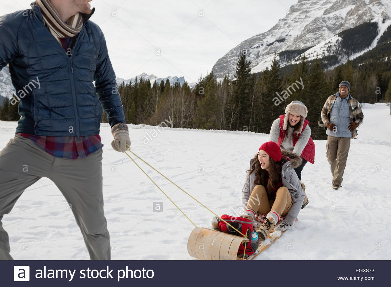 Three young men walking together field hi-res stock photography and ...