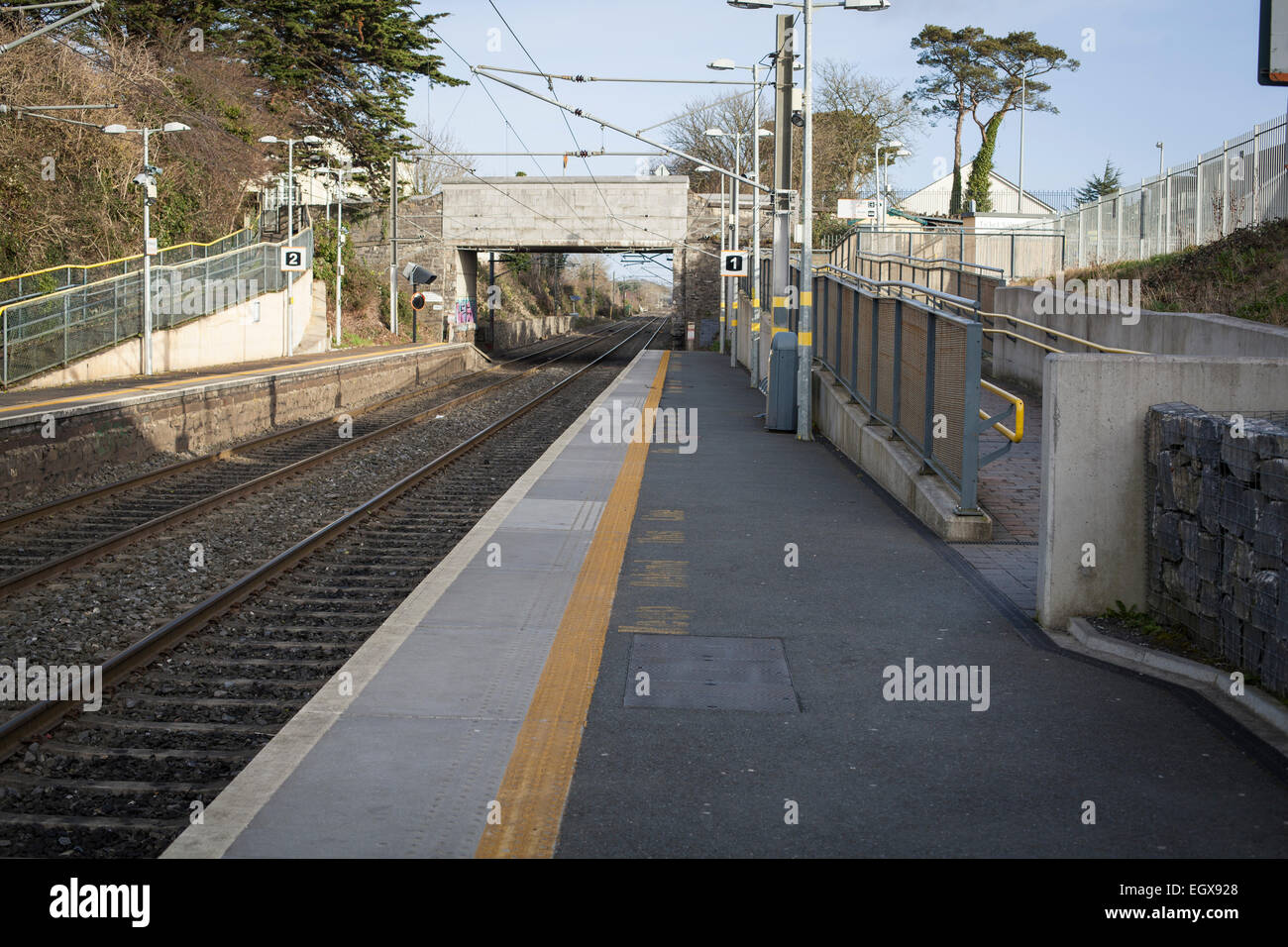Train stop and train tracks Stock Photo - Alamy